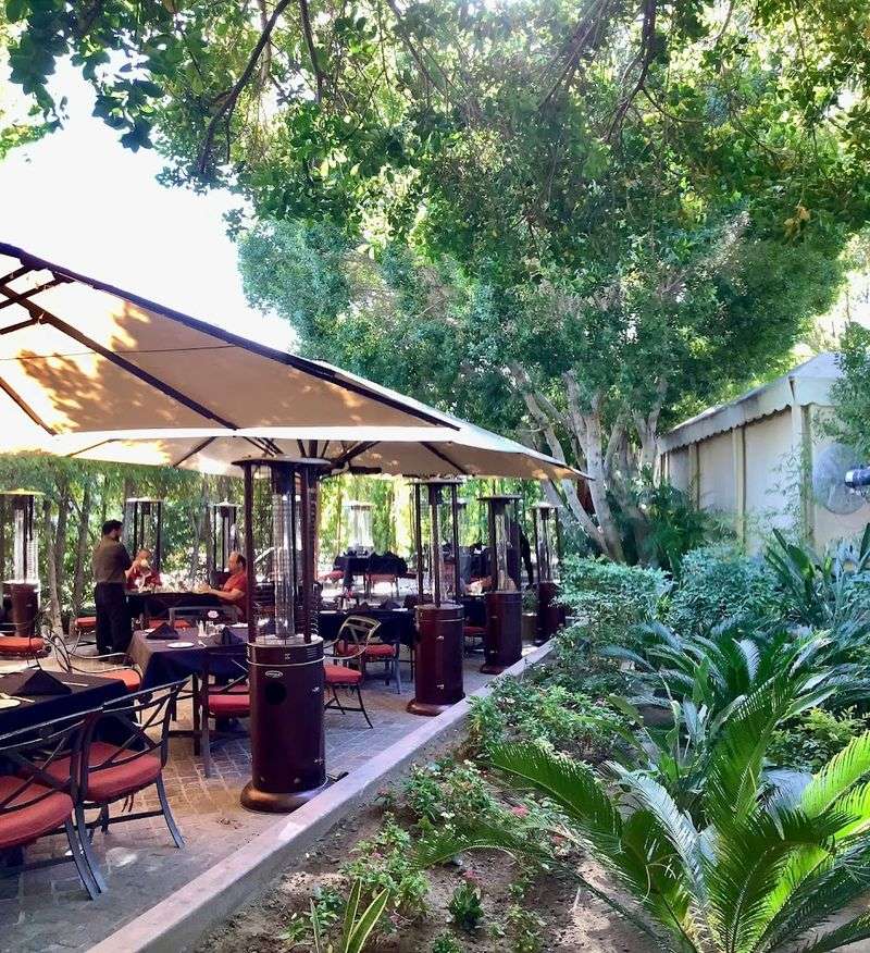 Dine beneath a breathtaking canopy of trees at this one-of-a-kind ...